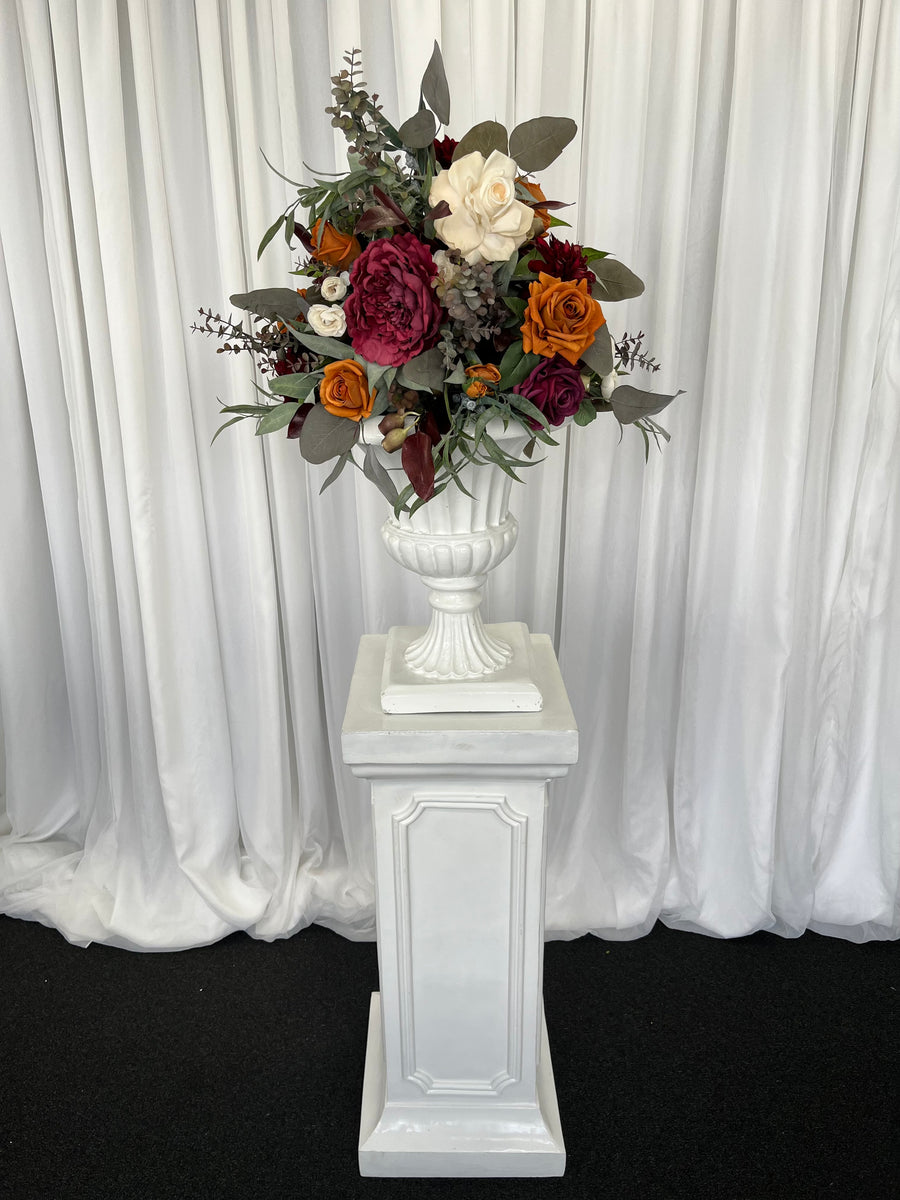 Classic plinth & urn with Mackenzie floral – Fairytale Events Pty Ltd