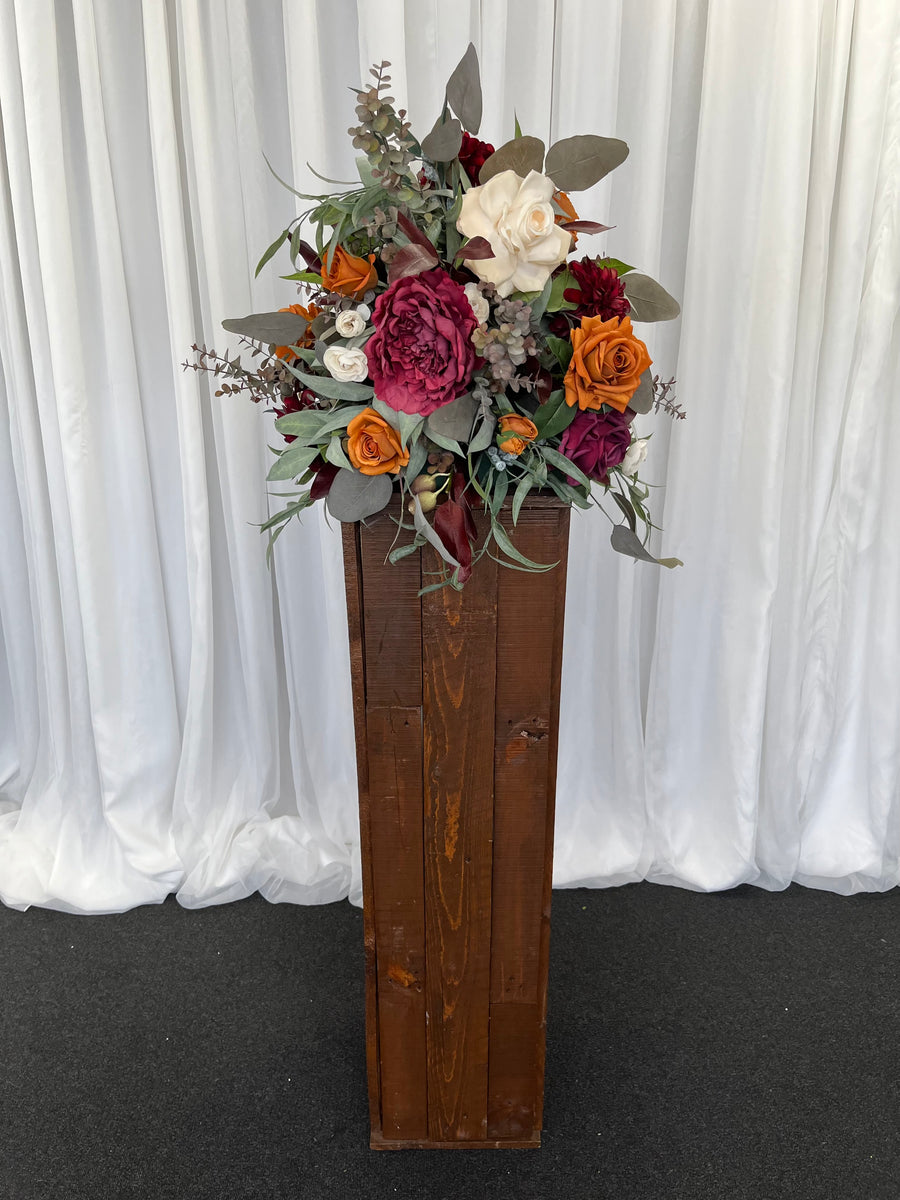 Rustic wooden plinth with Mackenzie floral – Fairytale Events Pty Ltd